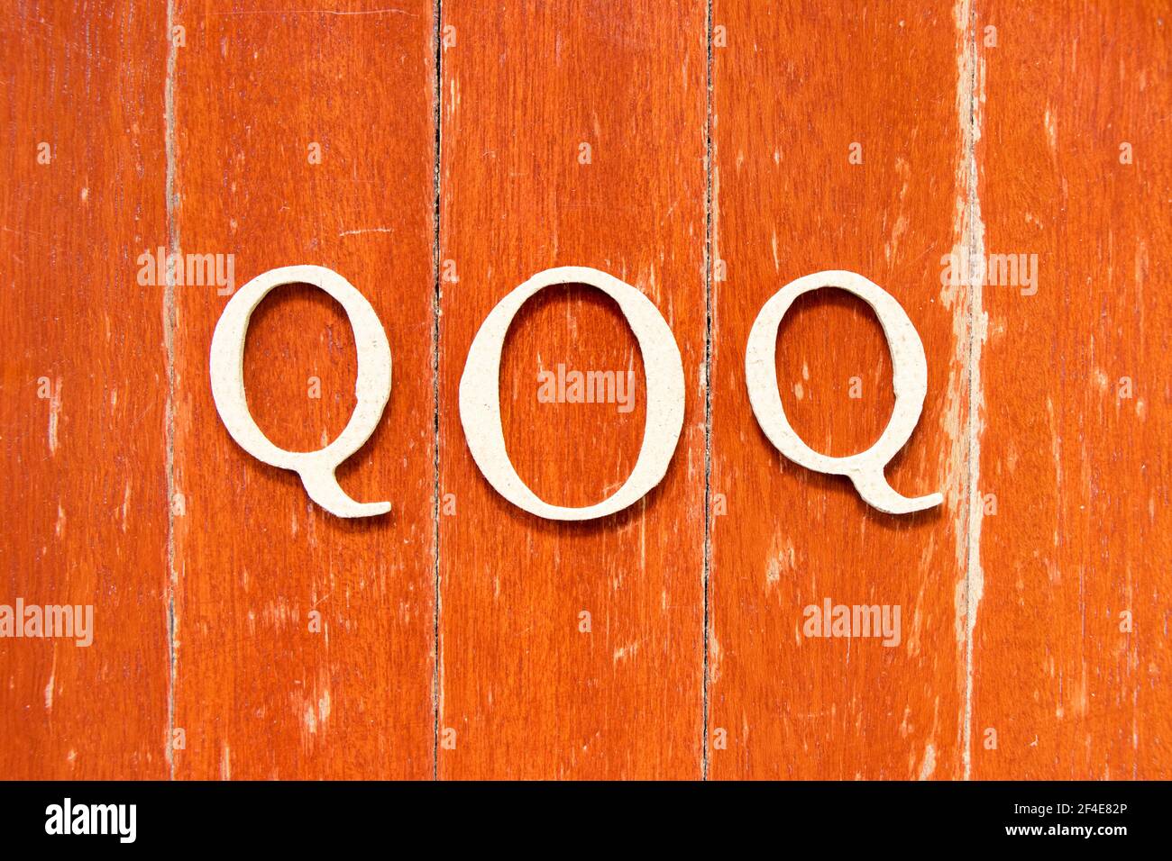 Alphabet letter in word QOQ (abbreviation of quarter on quarter) on old ...