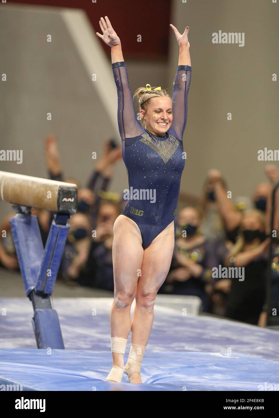 March 20, 2021: Michigan's Abby Heiskell.smiles as she salutes the ...