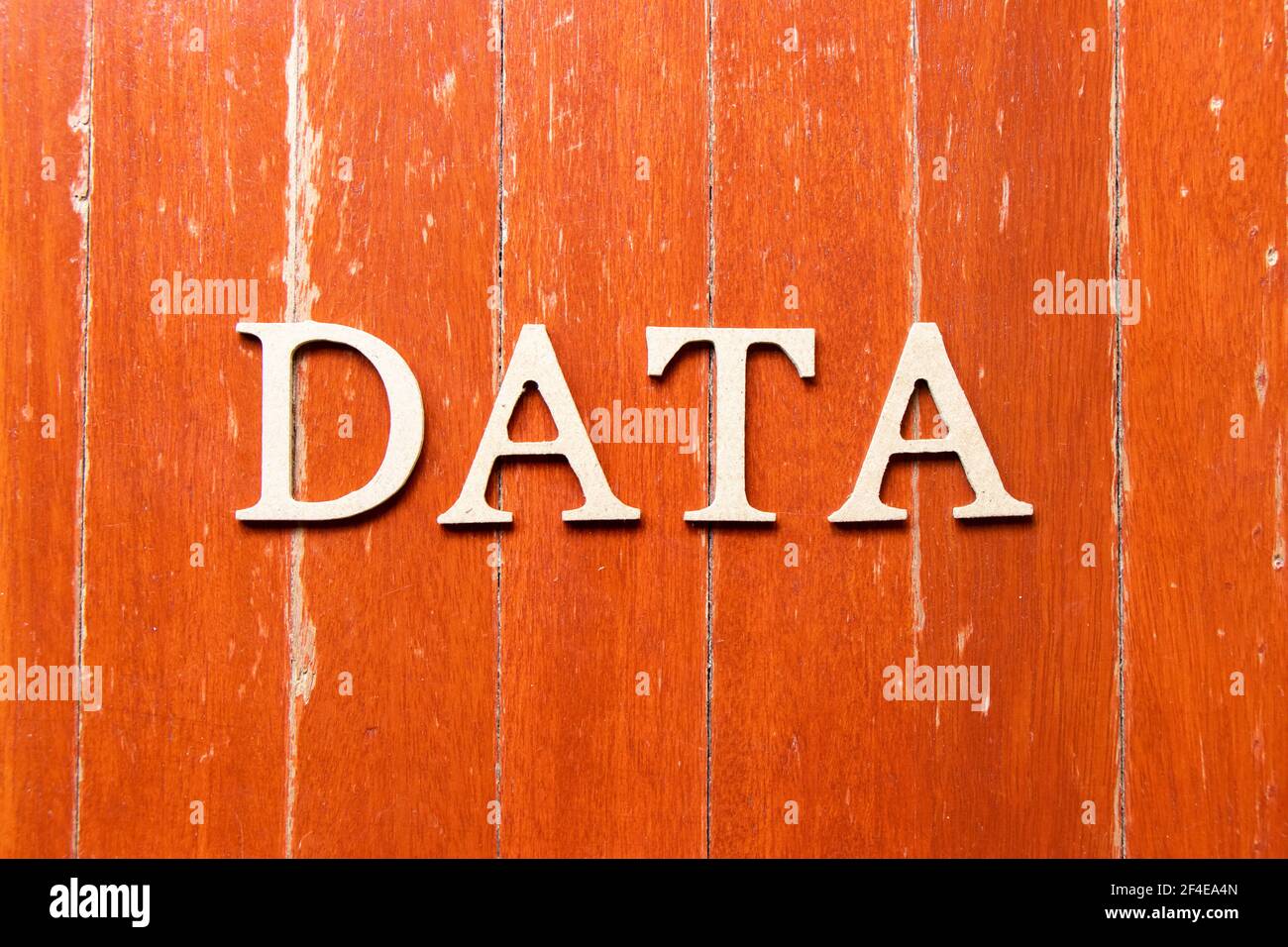 Alphabet letter in word data on old red color wood plate background ...