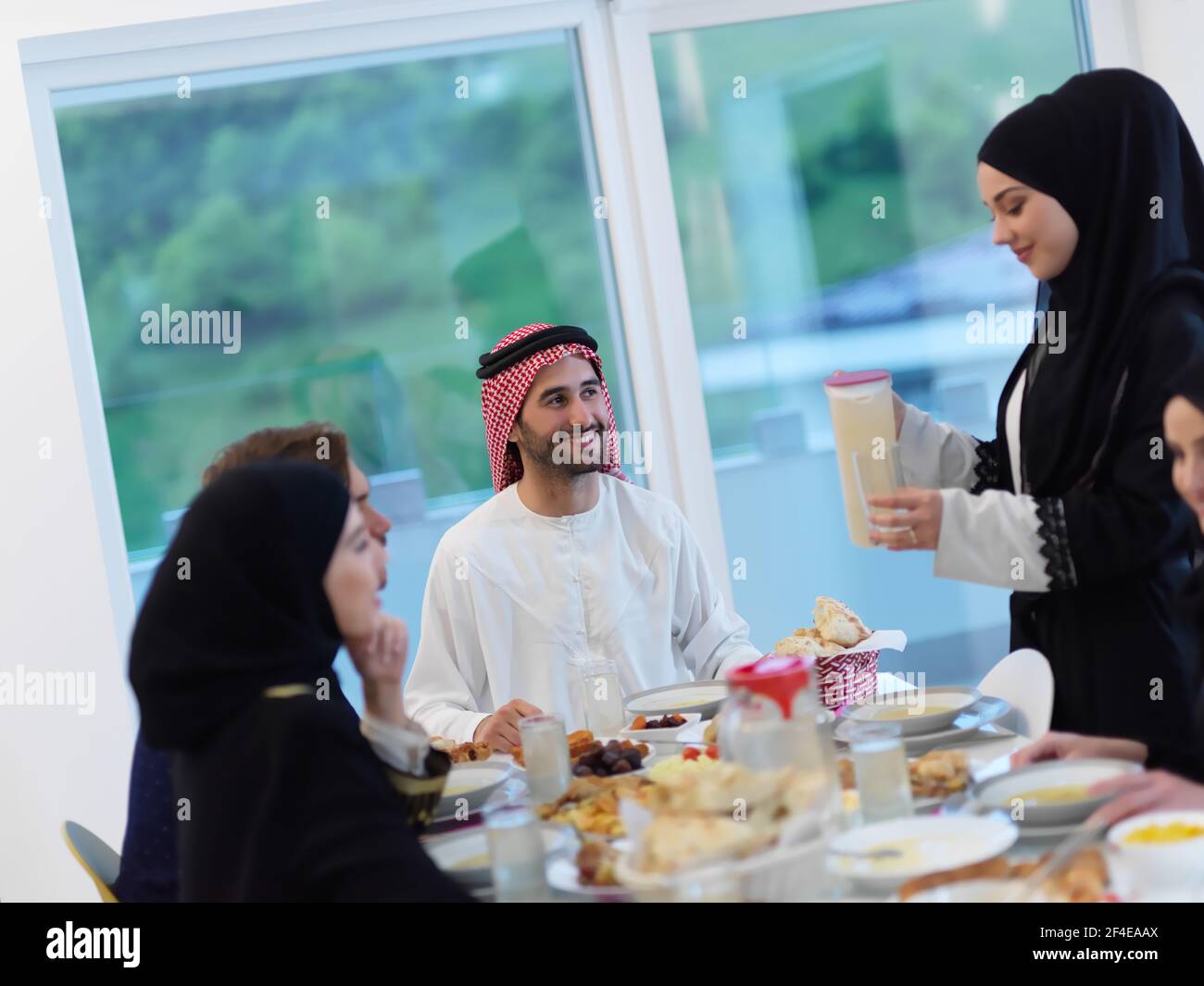 Muslim family having iftar together during Ramadan Stock Photo - Alamy
