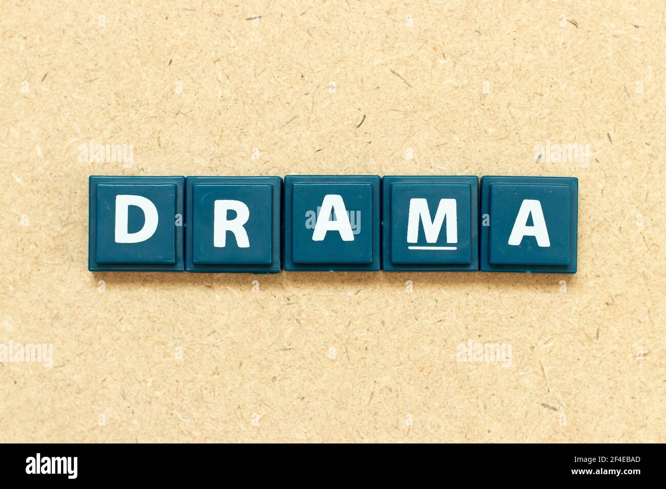 Tile alphabet letter in word drama on wood background Stock Photo - Alamy