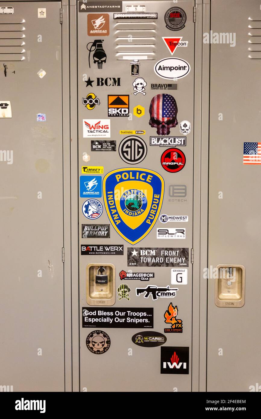 Weapon company logos adorn a metal locker door Stock Photo - Alamy