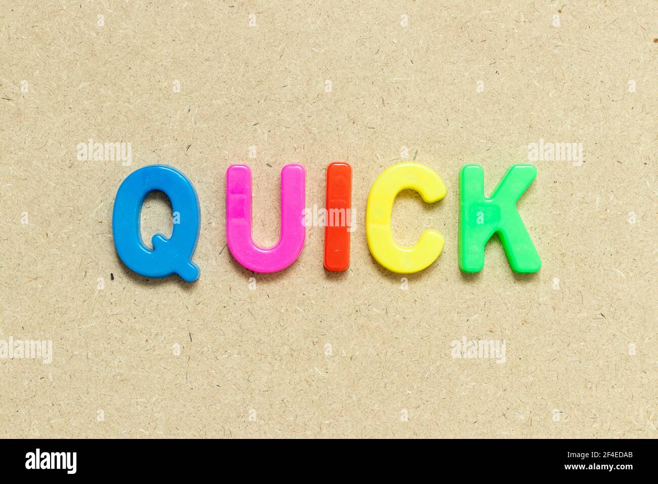 Color alphabet letter with word quick on wood background Stock Photo ...