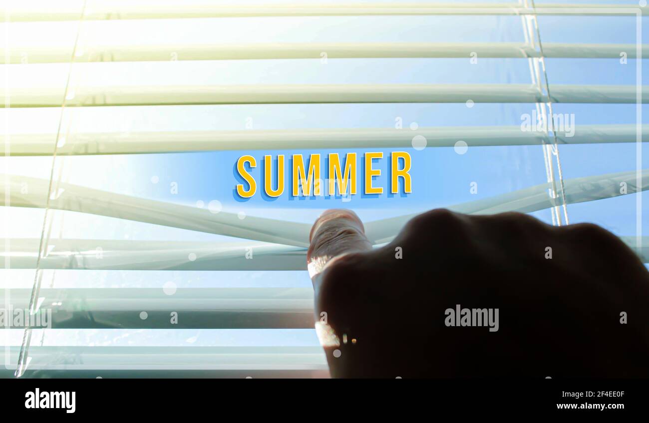 The sun shines through the half-open blinds on the window. Blinds ajar ...