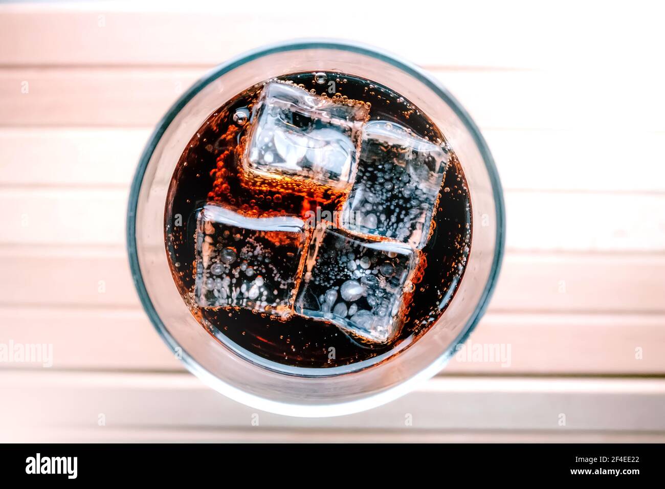 A glass of soda with ice cubes. Chilled drink in a glass Stock Photo ...