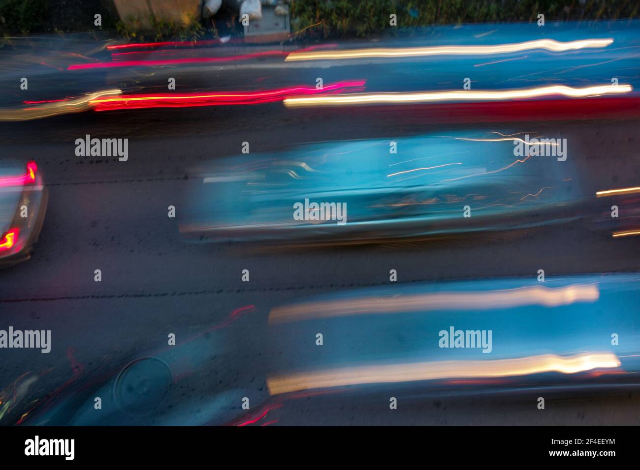 Cars and buses crowd the streets of Bangkok, Thailand contributing to ...