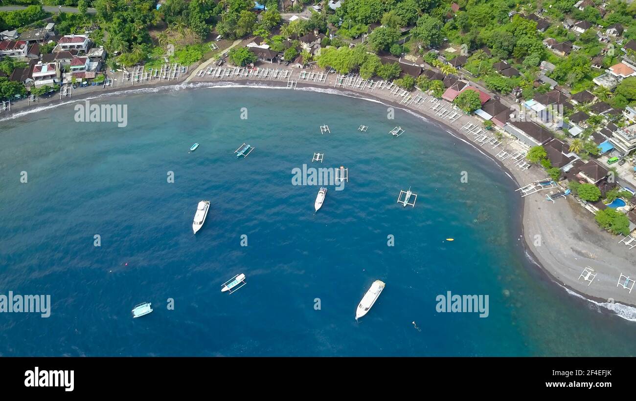 Aerial drone photo of Jemeluk Beach and beautiful blue lagoon with ...