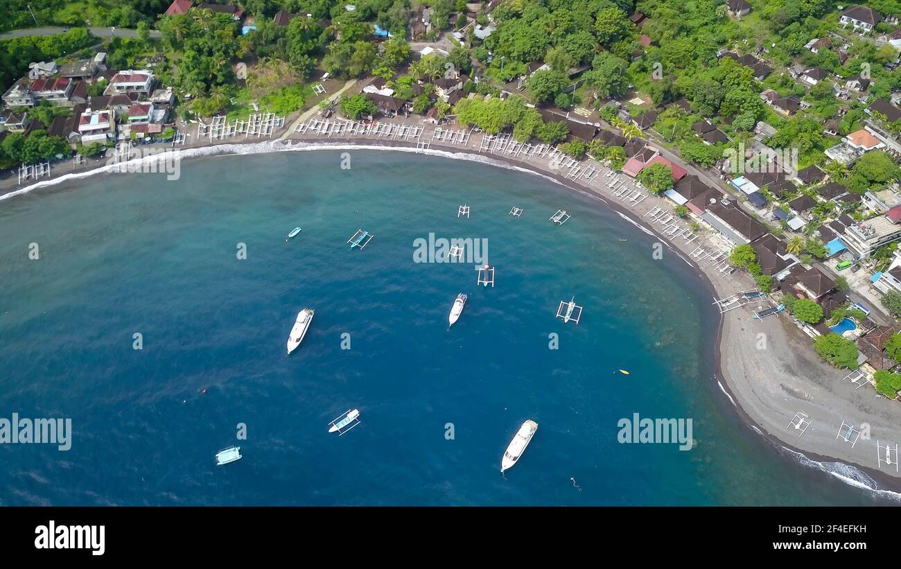 Aerial drone photo of Jemeluk Beach and beautiful blue lagoon with ...