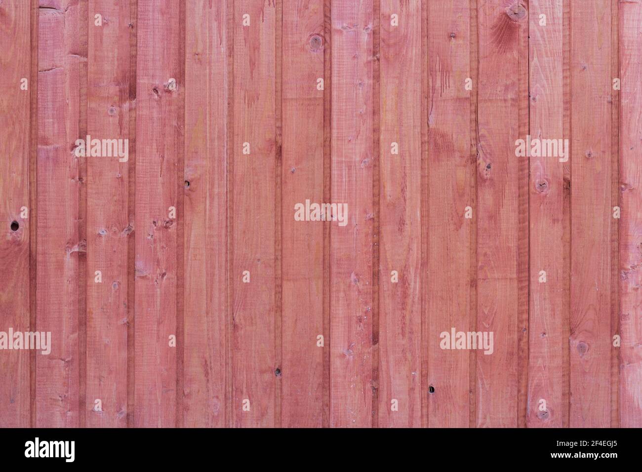 Texture of a wooden wall made of red slats Stock Photo - Alamy