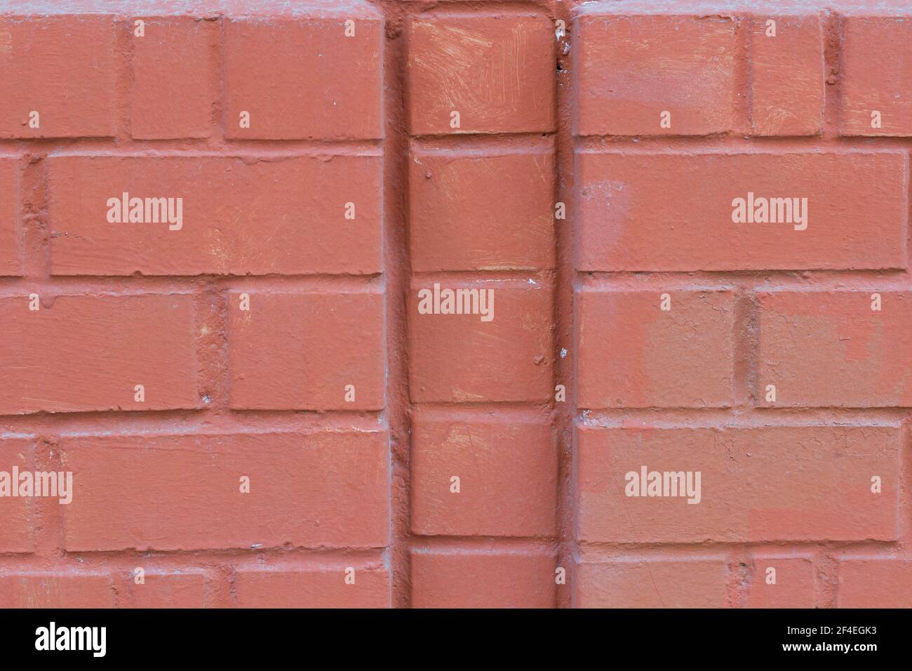 The texture of a red brick wall with a groove in the middle Stock Photo ...