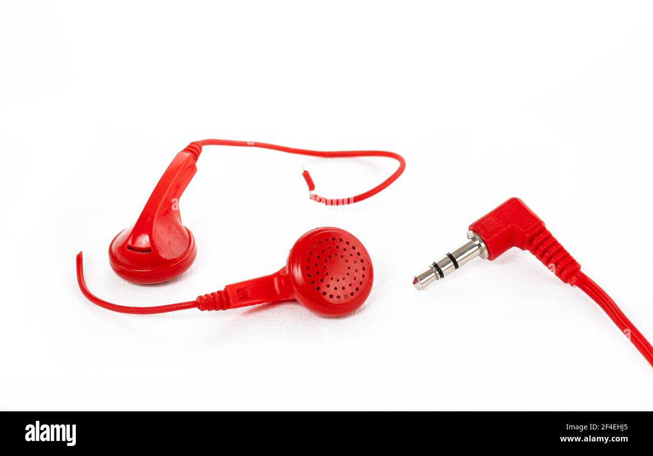 Headphones on a white background. Torn headphones. Repair of electronic ...