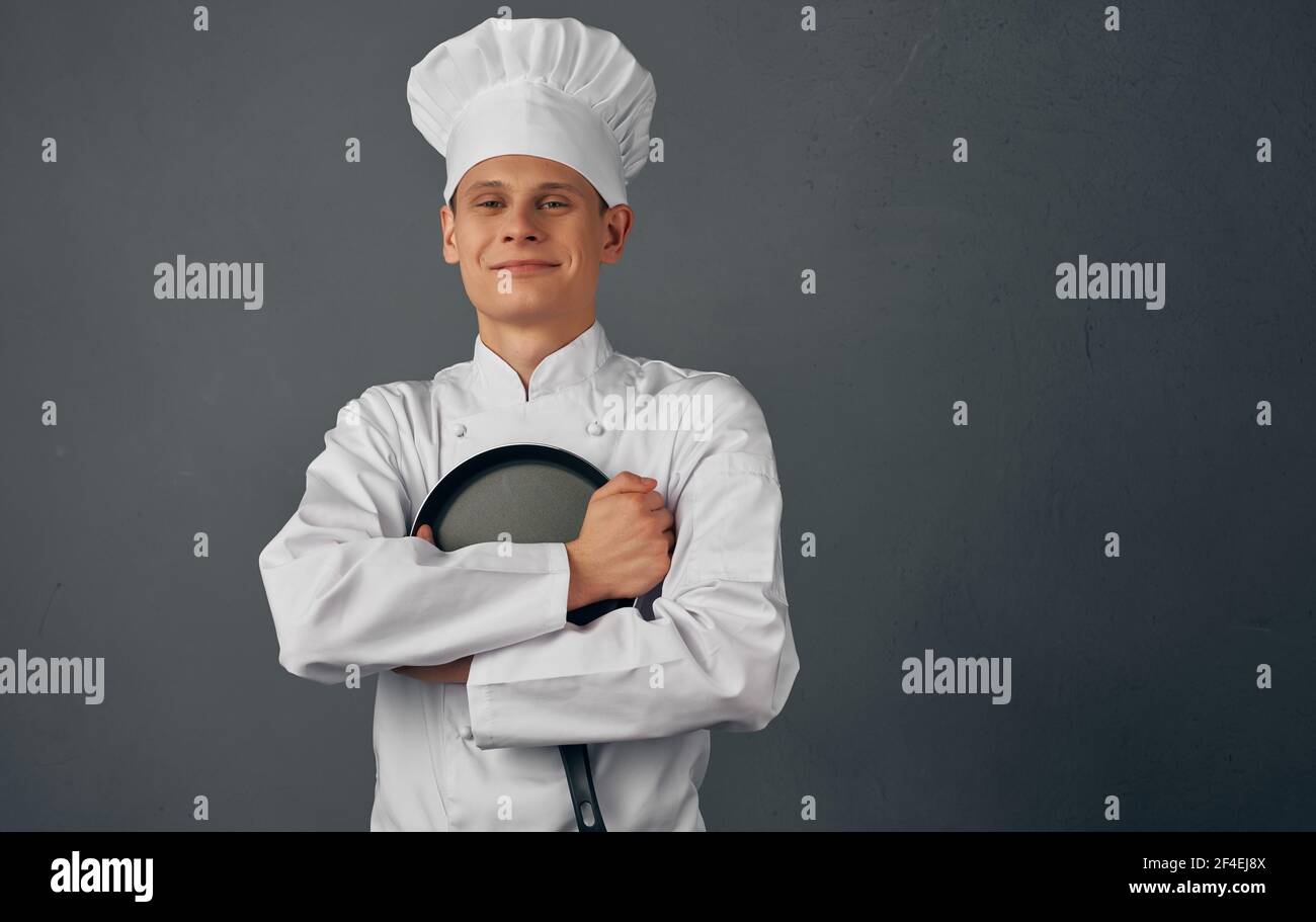 male chef kitchenware cooking in restaurant studio Stock Photo - Alamy