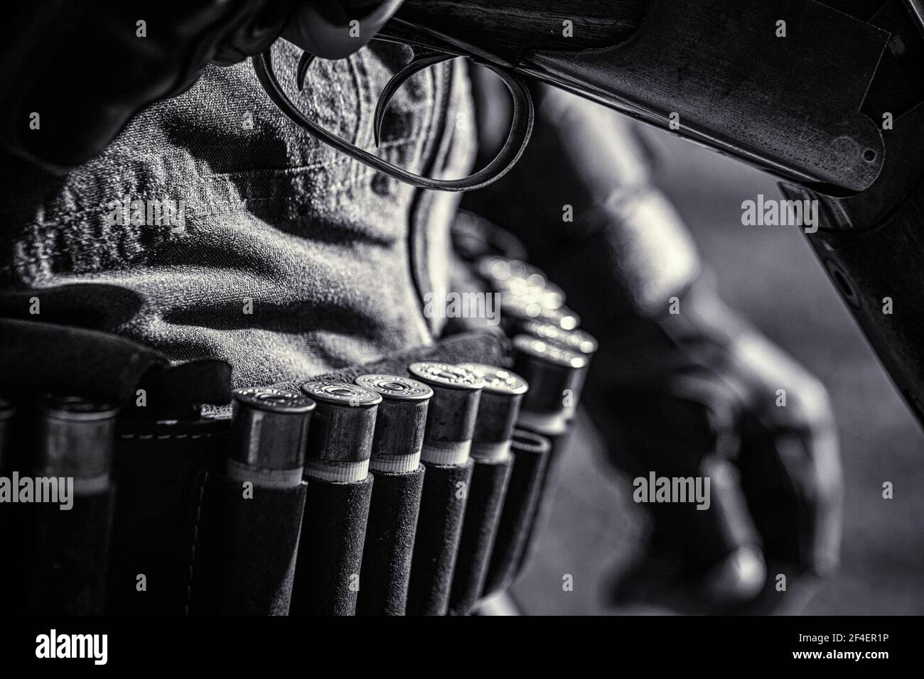 The man is on the hunt. Hunter with a backpack and a hunting gun ...