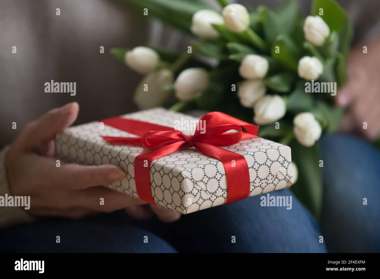 Hold gift hi-res stock photography and images - Alamy