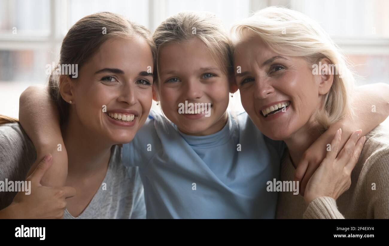 Portrait of smiling three generations of Caucasian women Stock Photo ...