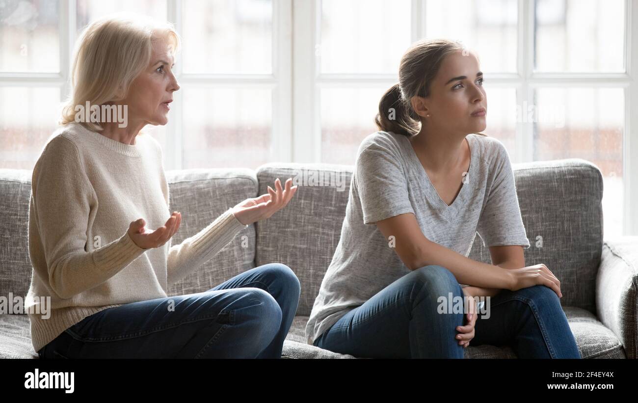 Mature mom and adult daughter have family misunderstanding Stock Photo ...