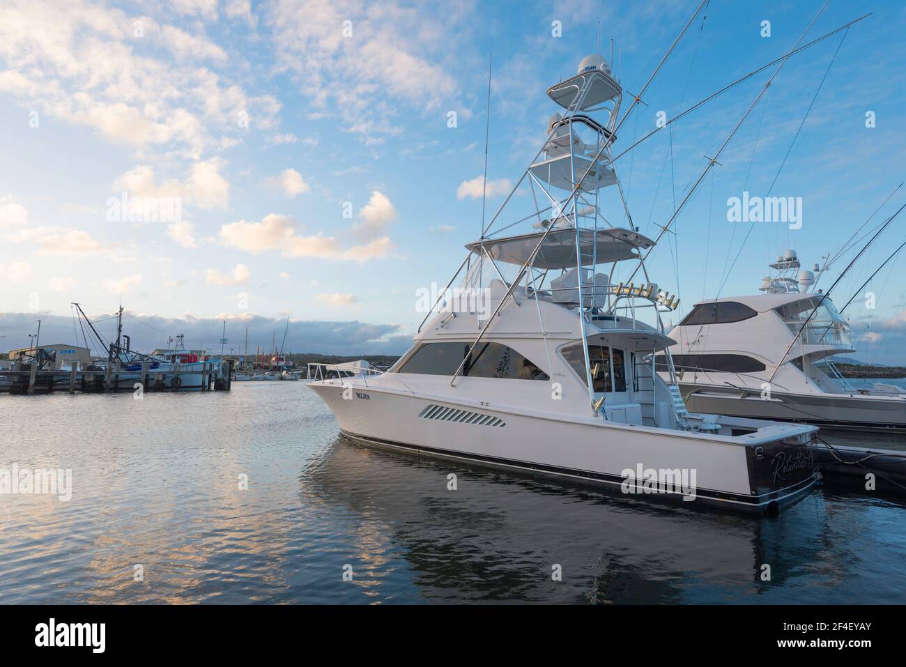 Deep sea fishing boats moored at the marina beside Bermagui Fisherman's ...