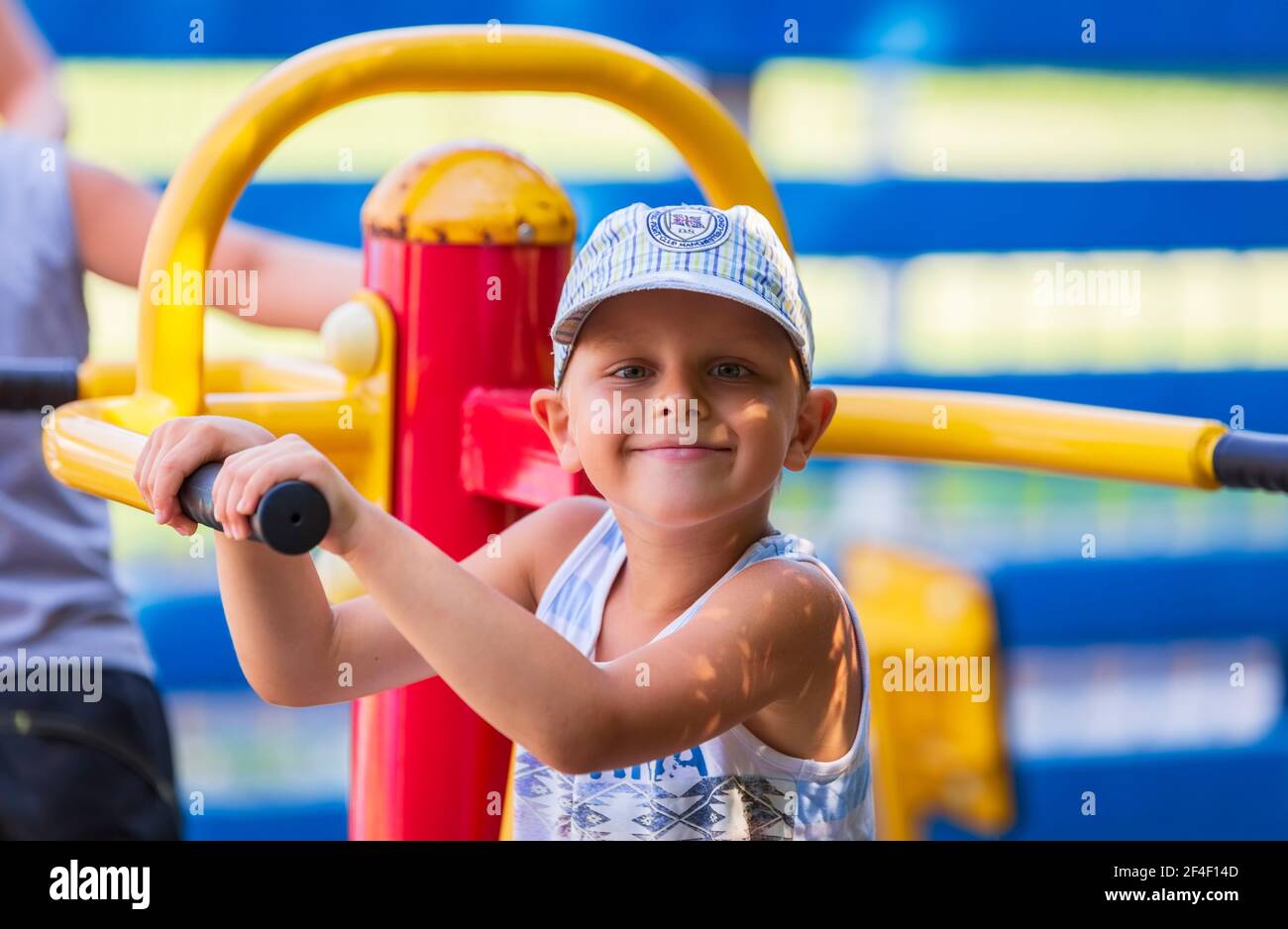 Little boy at the children's sports ground Stock Photo - Alamy