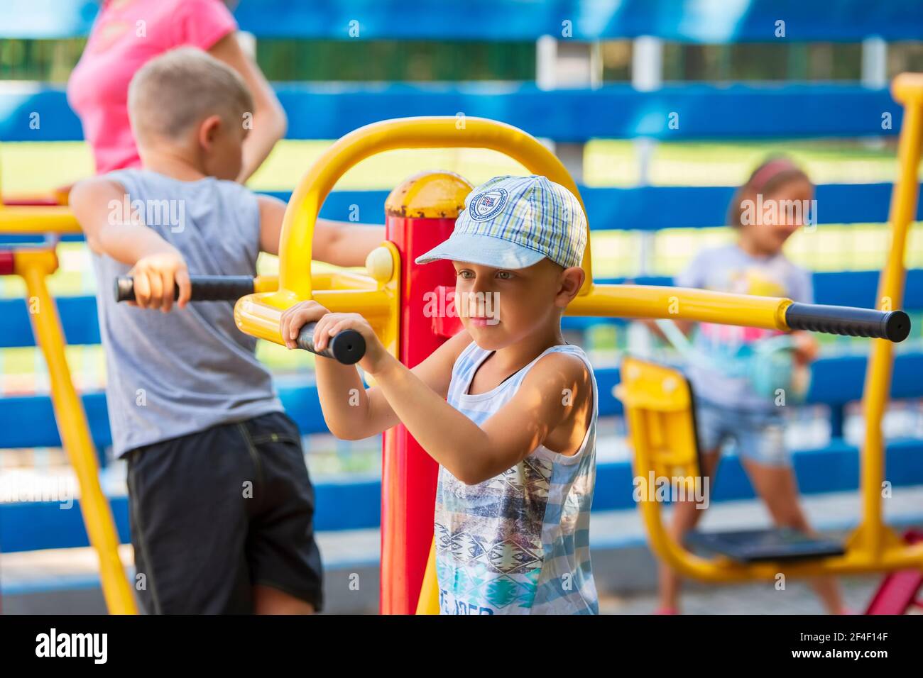 Little boy at the children's sports ground Stock Photo - Alamy