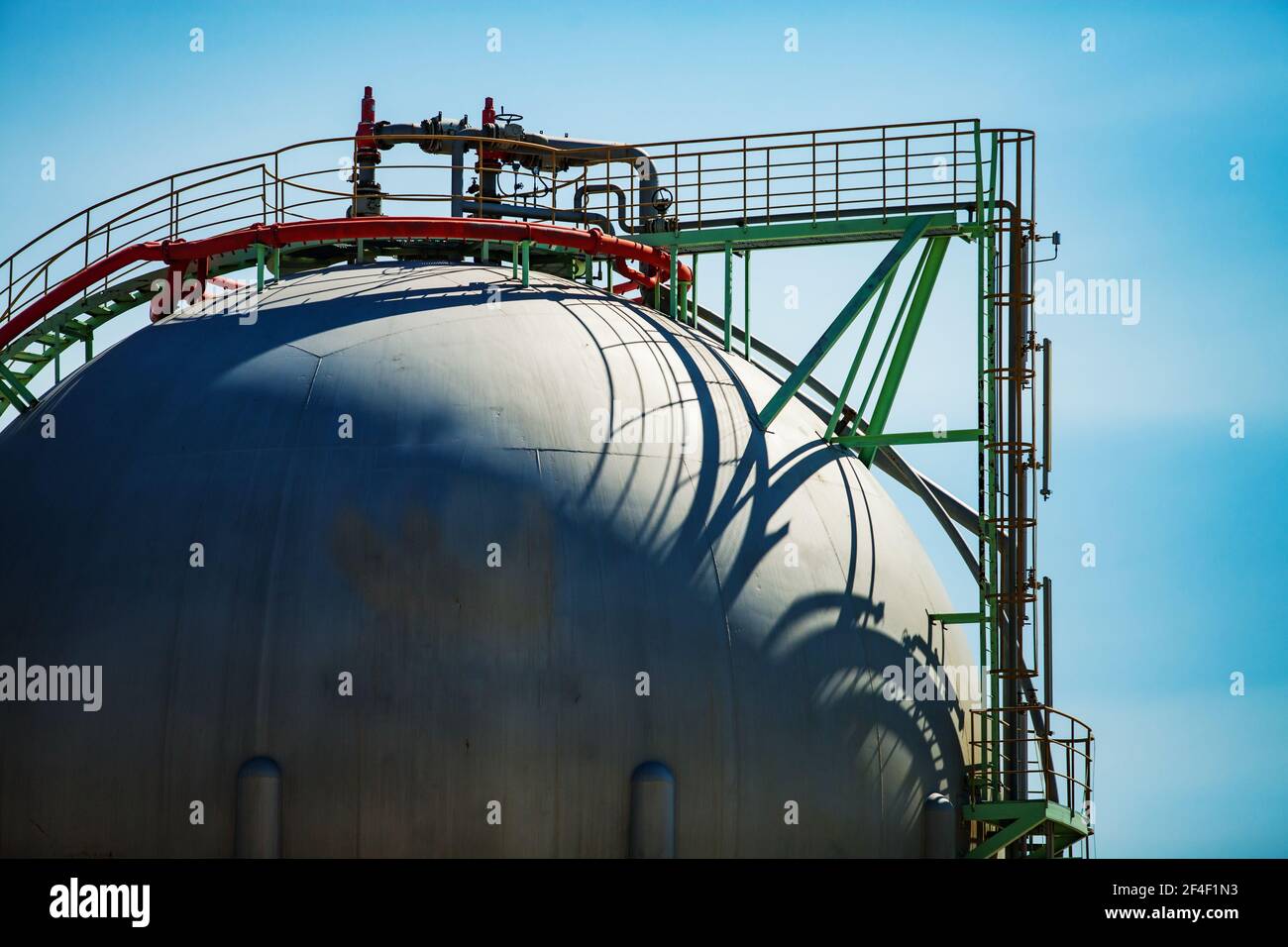 Oil refinery plant in desert. Sphere LPG gas storage tanks for ...