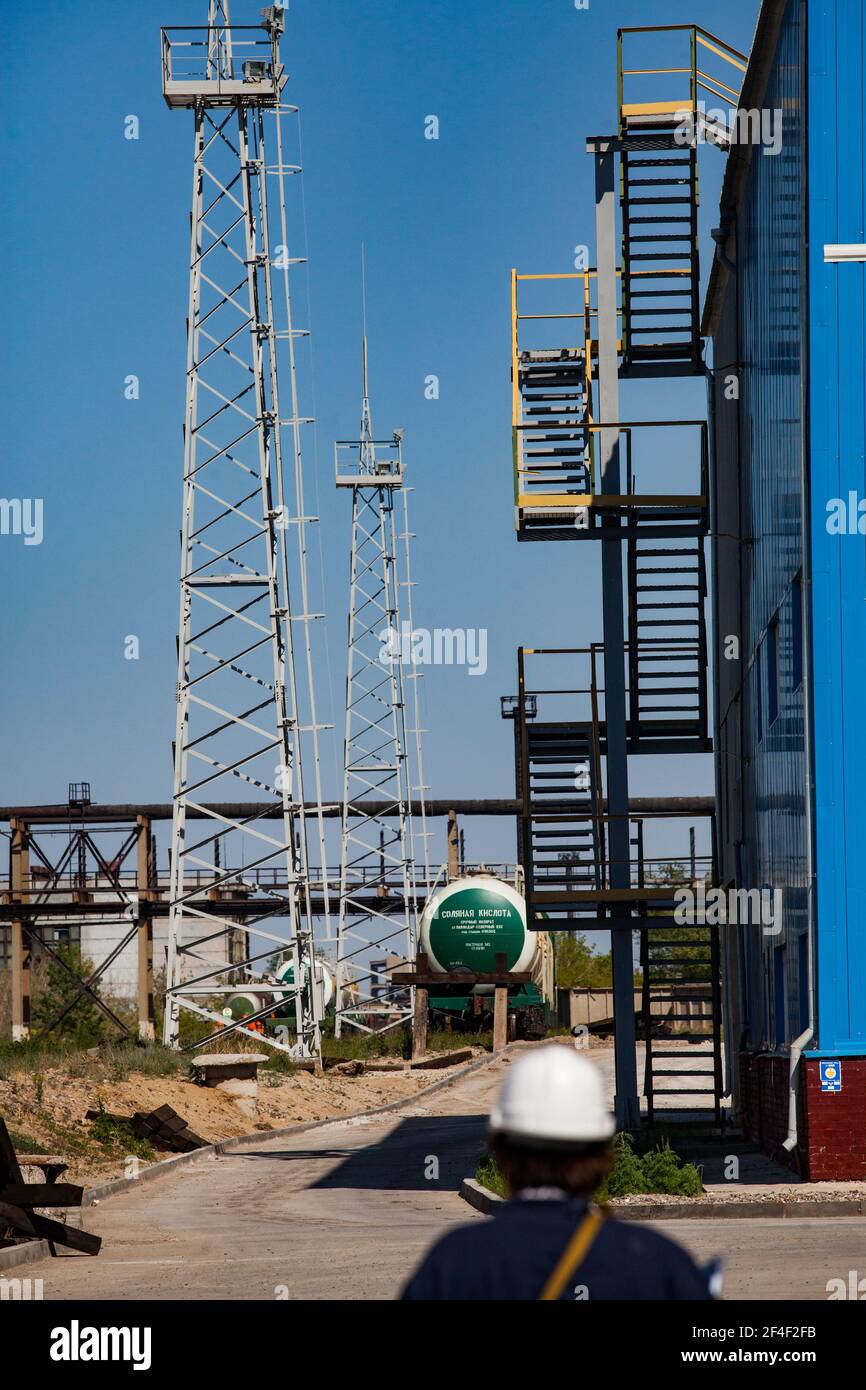Caustic chemical plant. Railway loading terminal. Green and blue ...