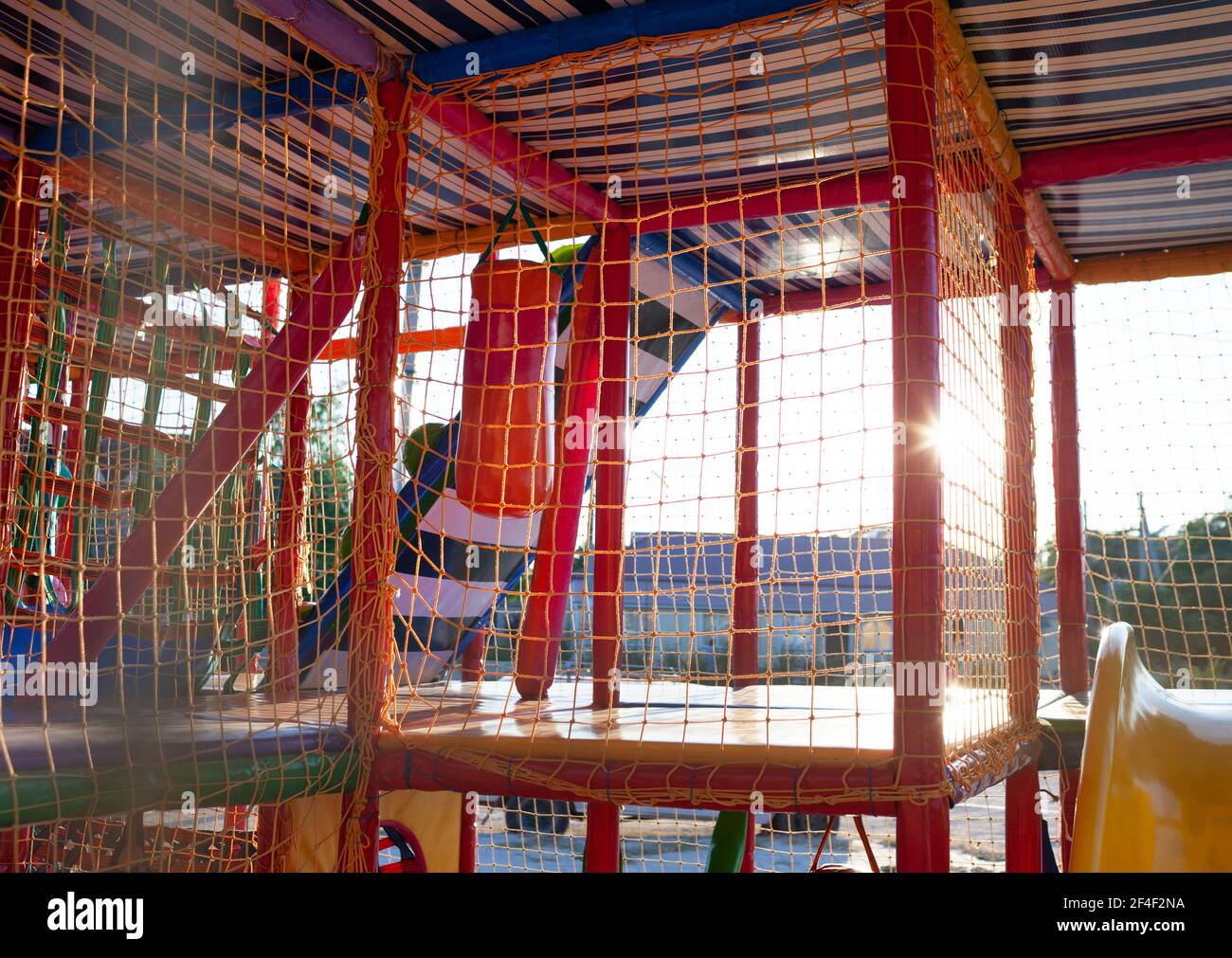 Playground with colorful mats and soft items for games Stock Photo - Alamy