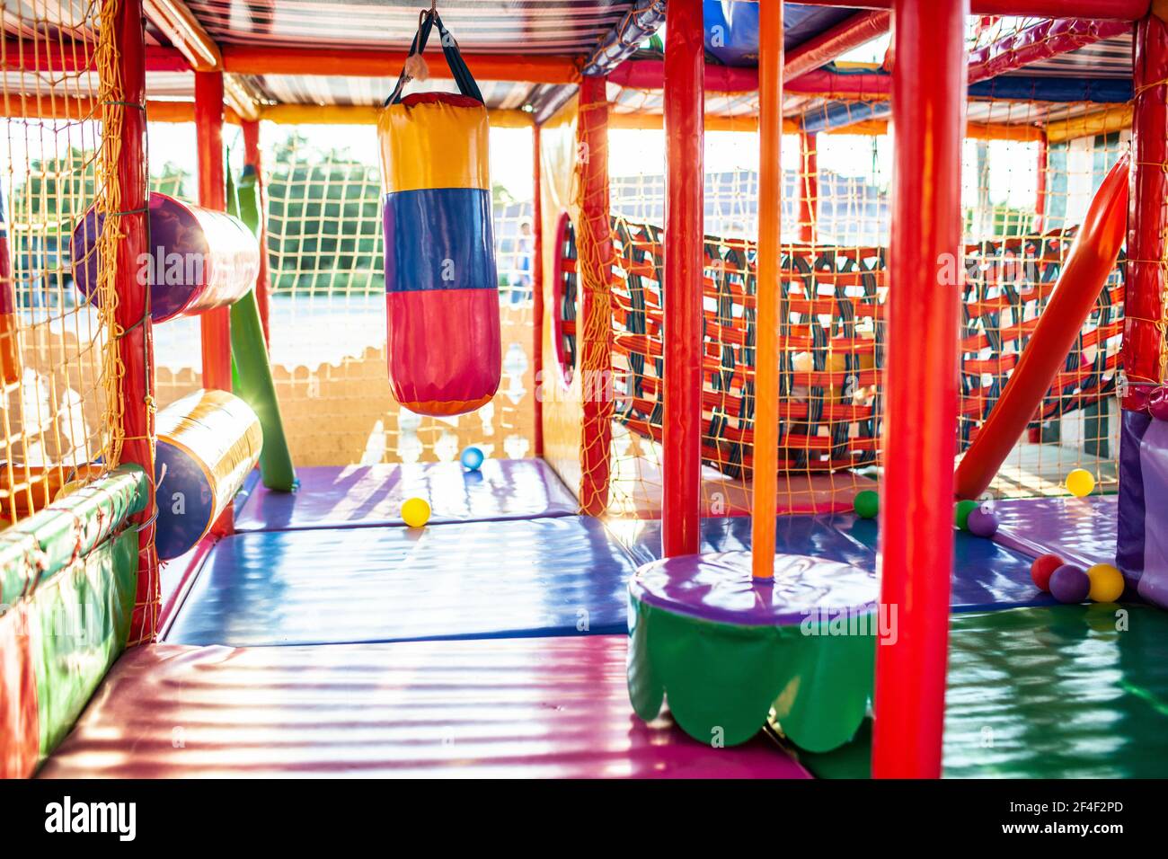 Playground with colorful mats and soft items for games Stock Photo - Alamy
