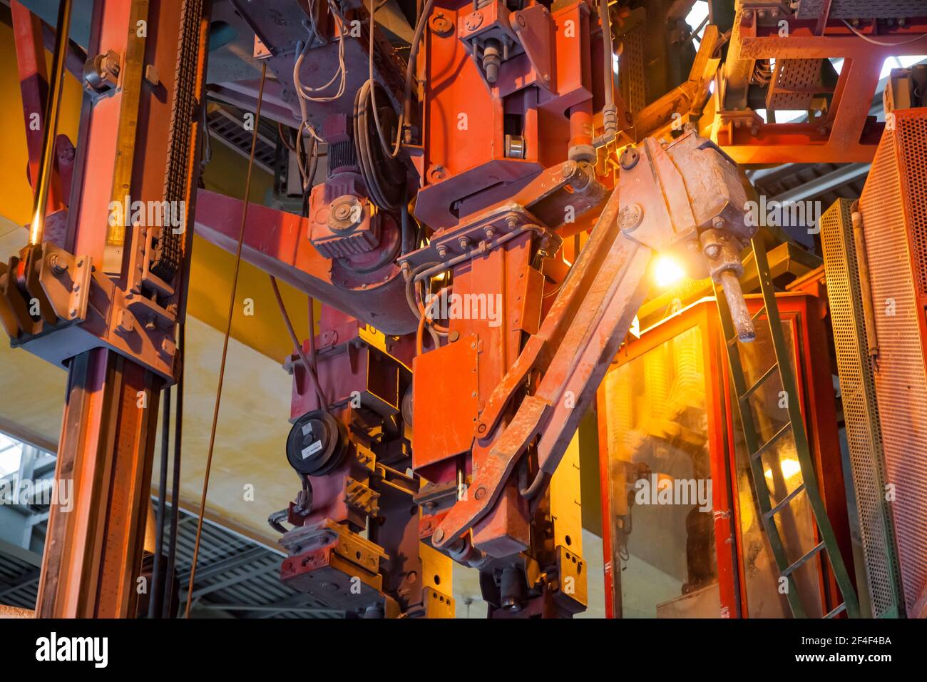 Aluminum electrolysis plant. orange slag handling crane machine close ...