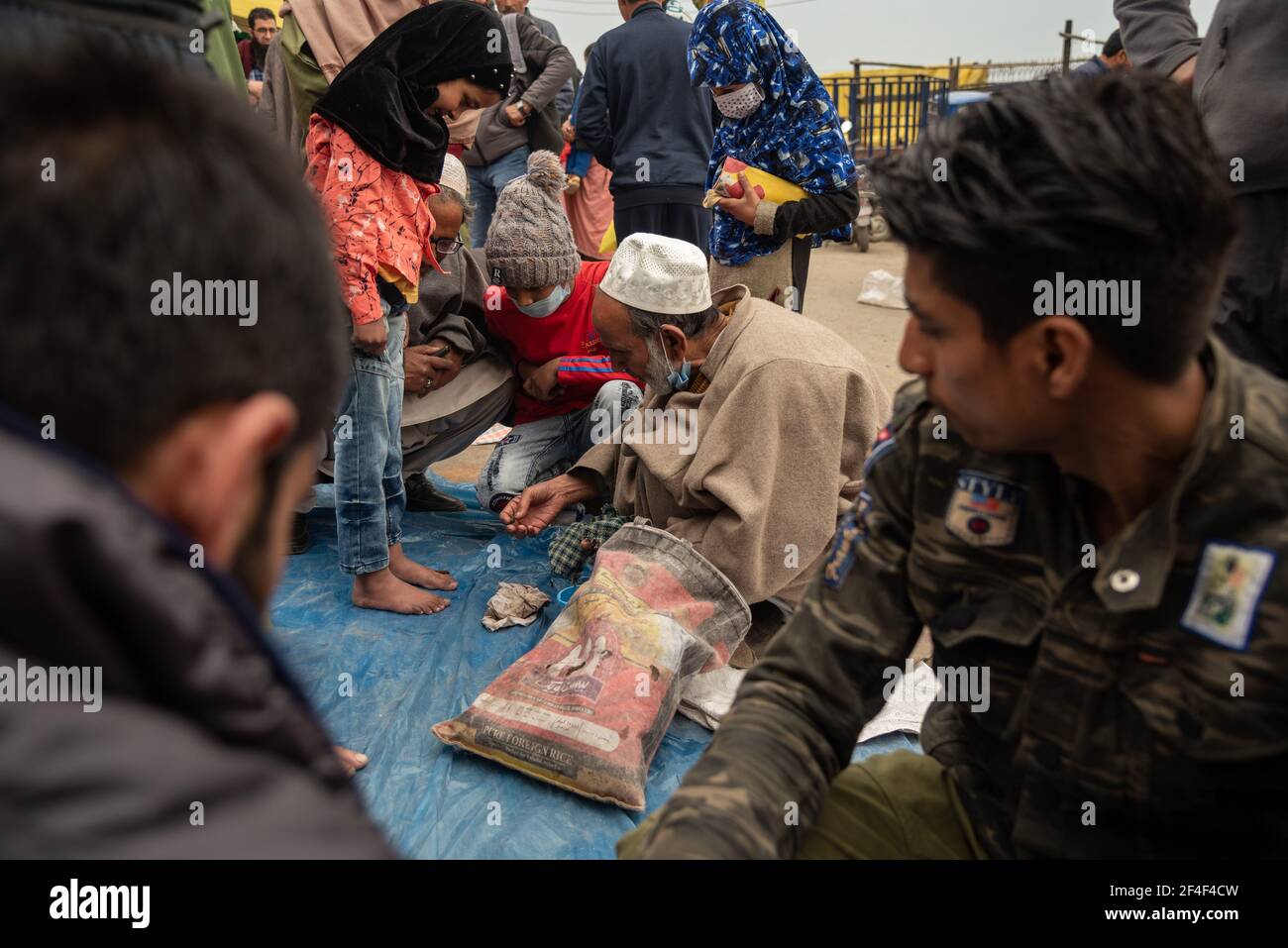 Srinagar, India. 21st Mar, 2021. A Kashmiri girl receives leech ...