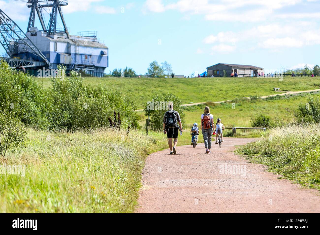 Family walking at St Aidan's Nature Reserve, Leeds, West Yorkshire ...
