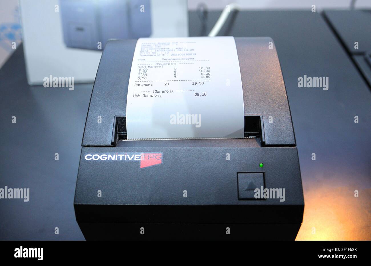 Receipt printer of the cash recycler working. Exhibition Retail ...
