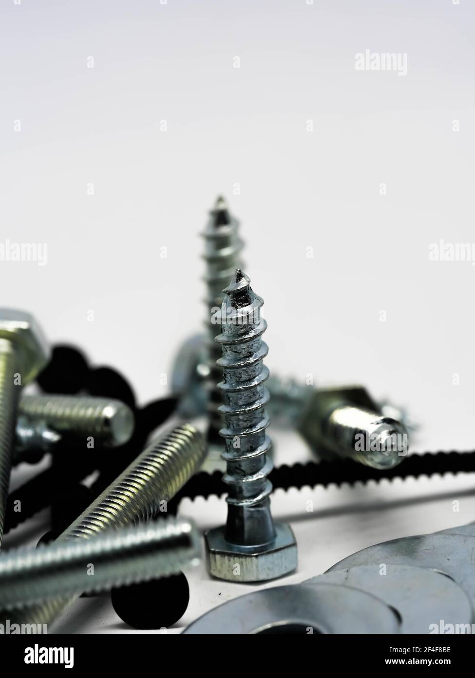 Screw and nuts. Industrial object Stock Photo - Alamy