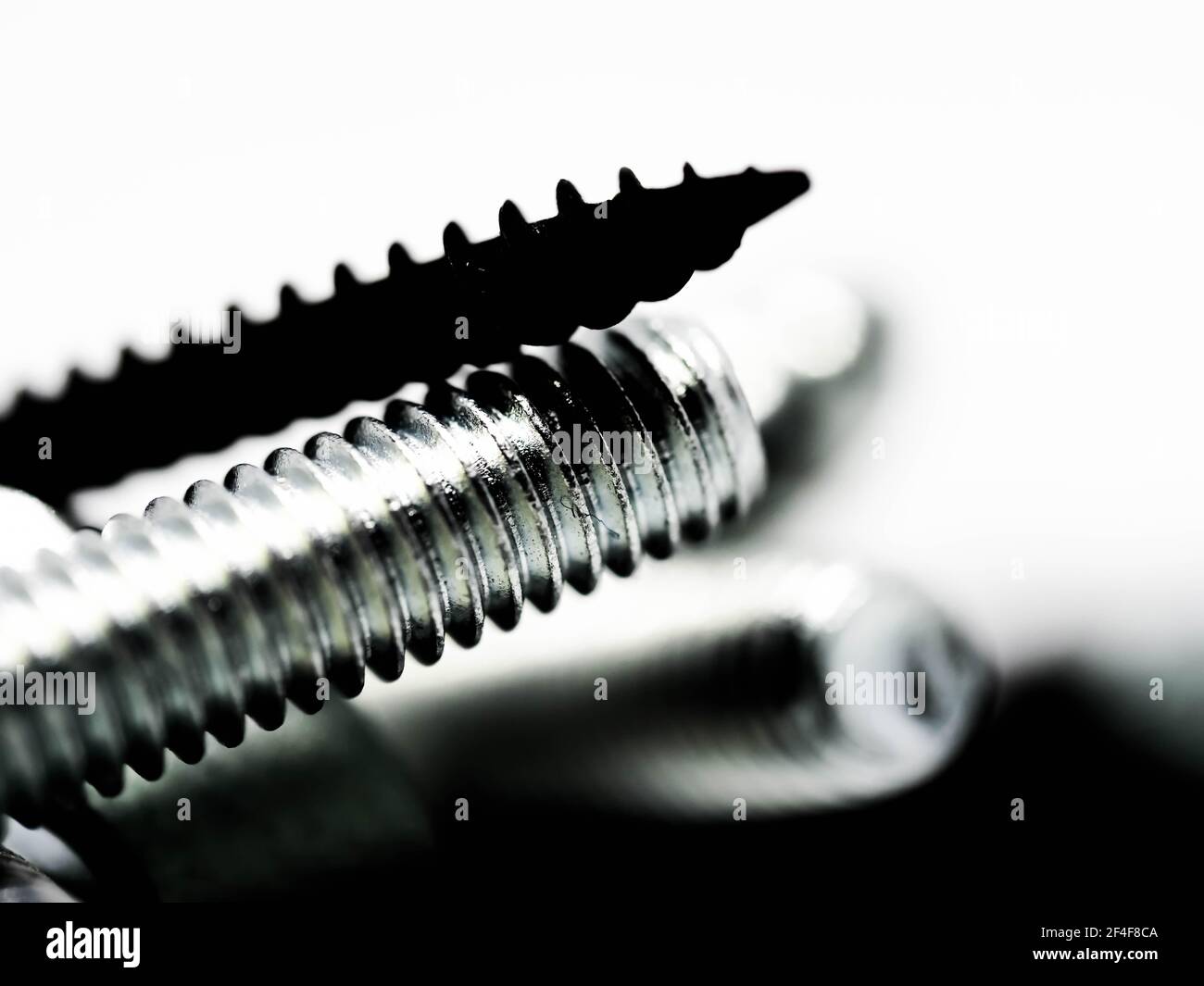 Screw and nuts. Industrial object Stock Photo - Alamy