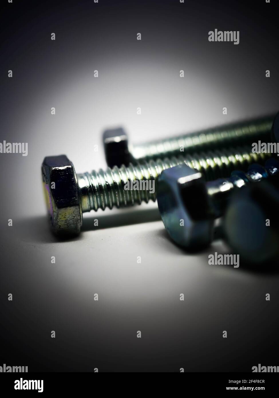 Screw and nuts. Industrial object Stock Photo - Alamy