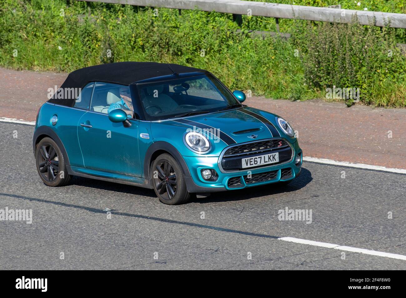 Turquoise mini convertible cars hi-res stock photography and images - Alamy