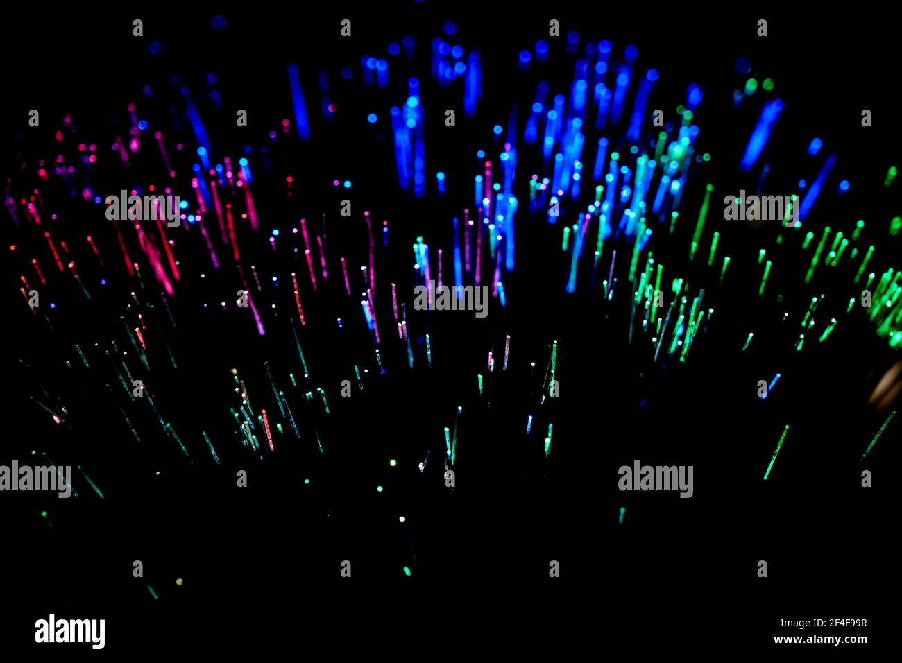 Optical fiber network cable on black background Stock Photo - Alamy