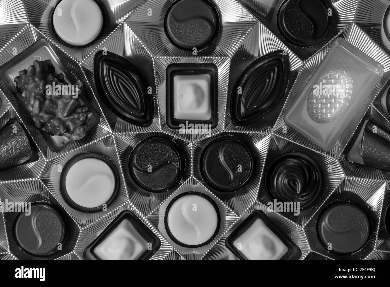 Chocolate candy in gift Black and White Stock Photos & Images - Alamy