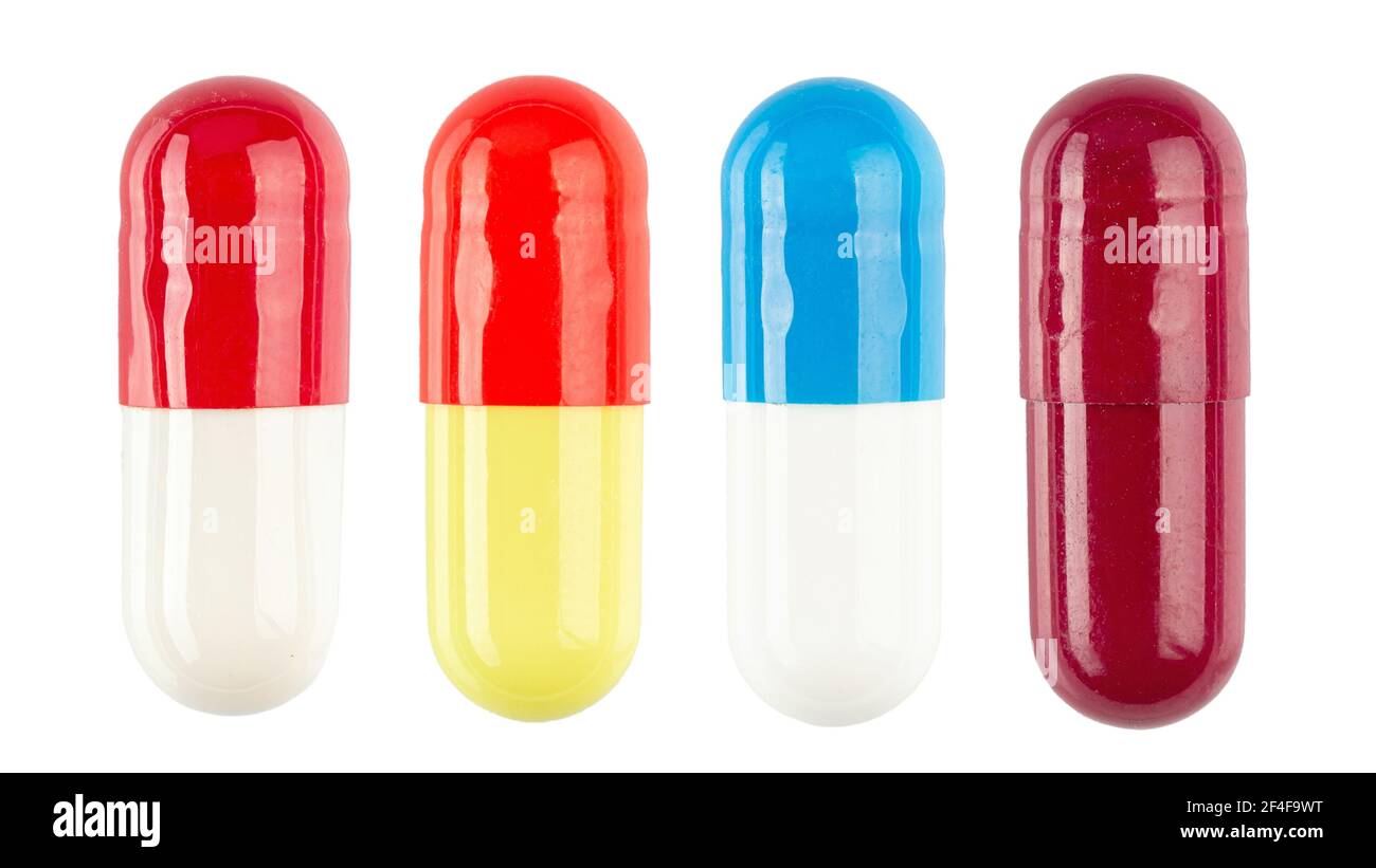 Set of tablets in capsules isolated on white background. Pharmacy ...