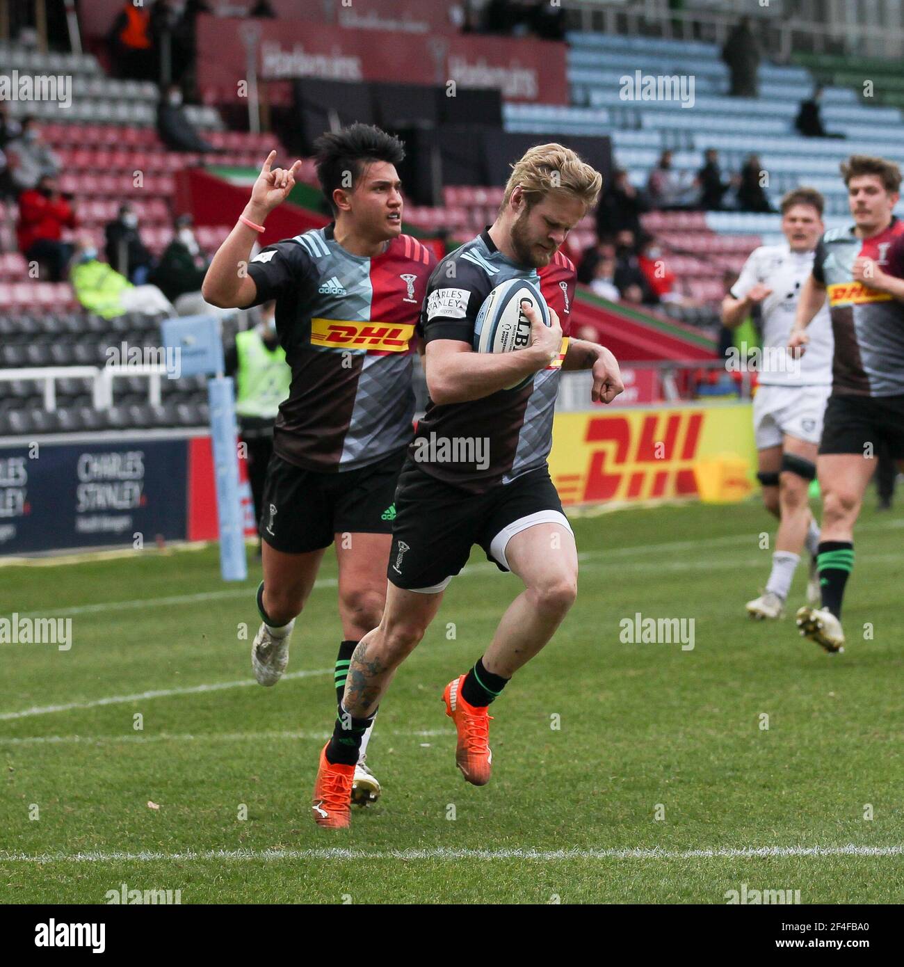 Twickenham, UK. 20th Mar, 2021. Tyrone Green of Harlequins scores a try ...