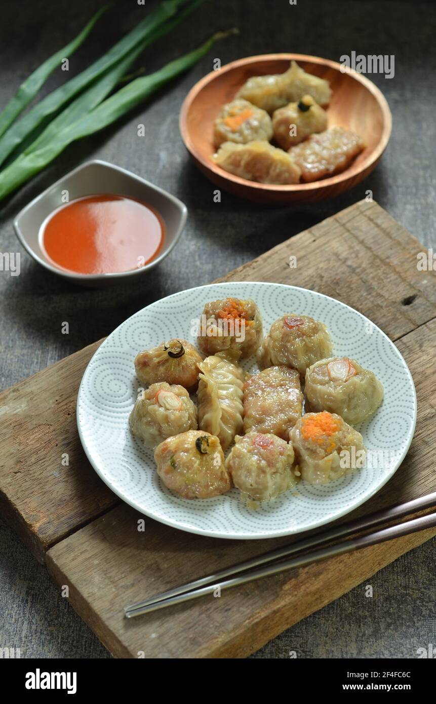 Delicious dim sum appetizer and complementary on plate Stock Photo - Alamy
