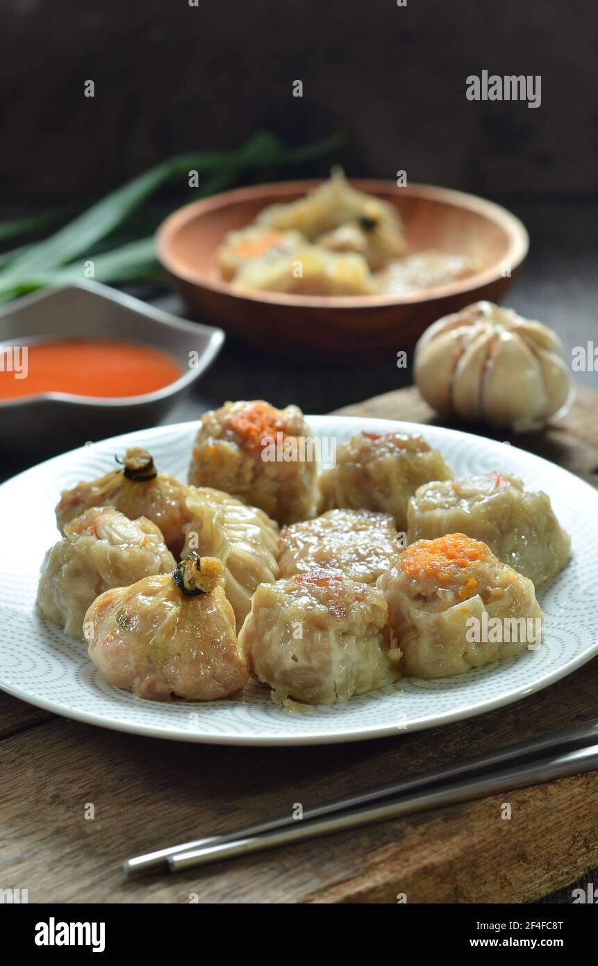 Delicious dim sum appetizer and complementary on plate Stock Photo - Alamy