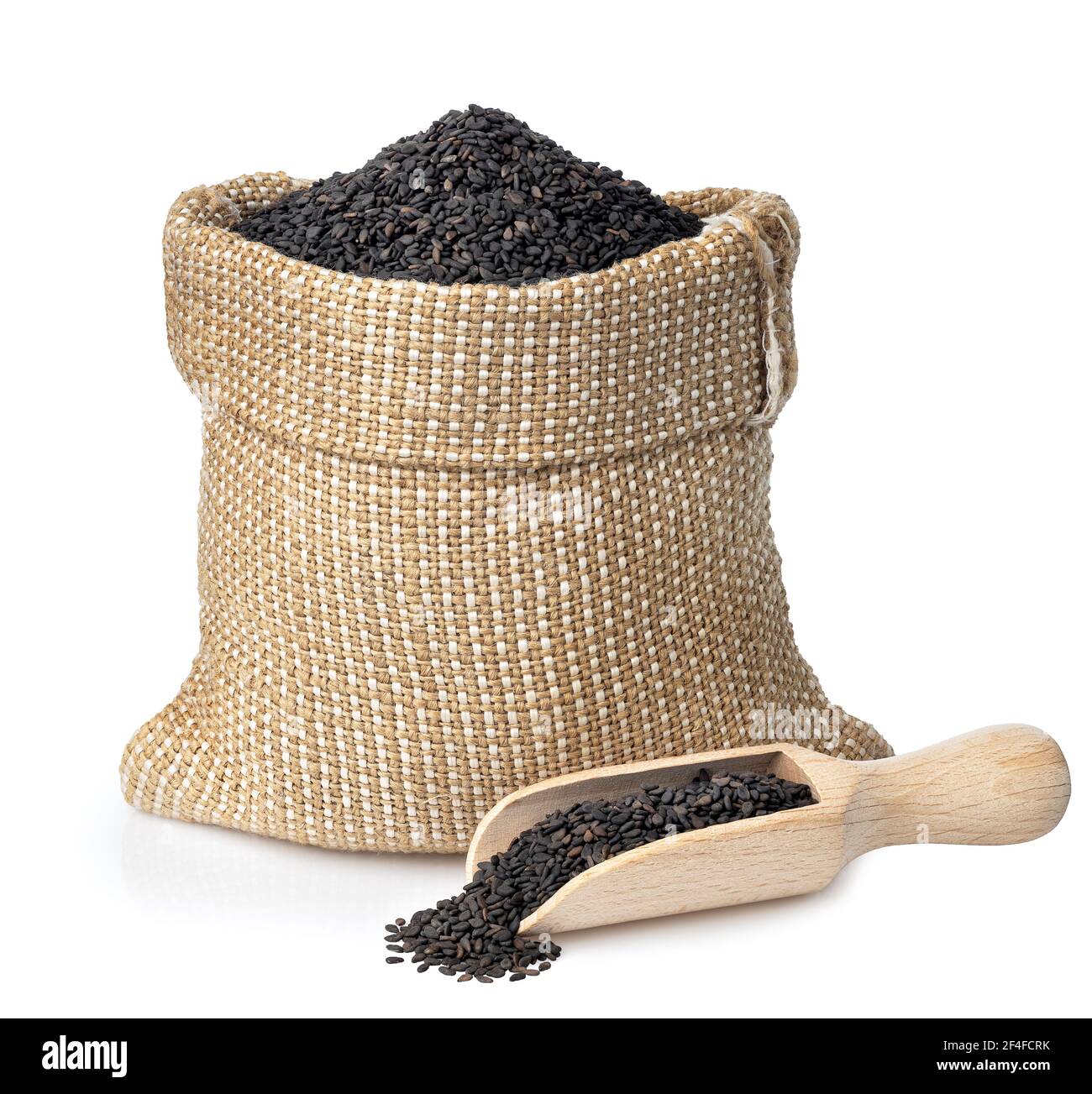 black sesame seeds in burlap sack isolated Stock Photo - Alamy