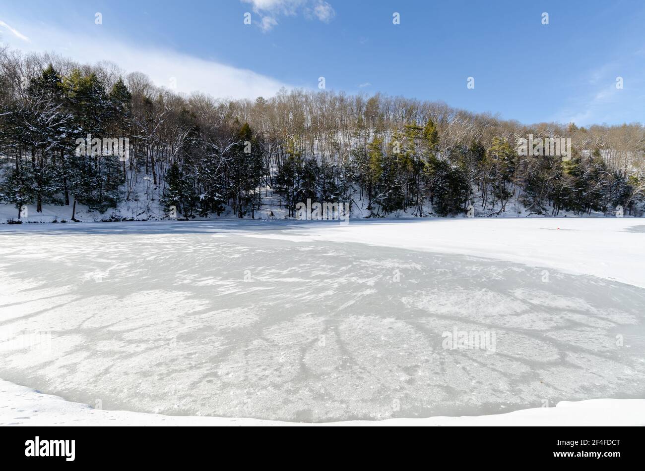 Frozen over lake at a state park after a blizzard Stock Photo - Alamy