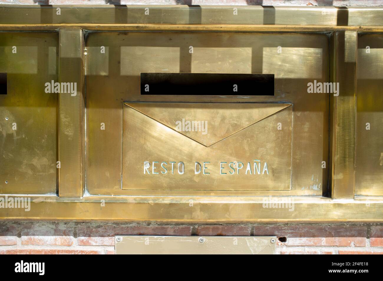 Post office golden brass mailbox. Engraved sentence in spanish Other ...