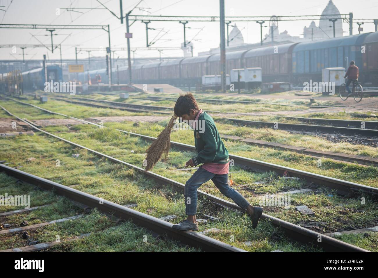 Varanasi. India. 11-02-2018. A lonely boy working at the Varanasi train ...