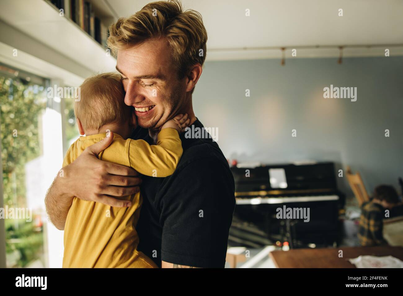 Father holding new born baby hi-res stock photography and images - Alamy