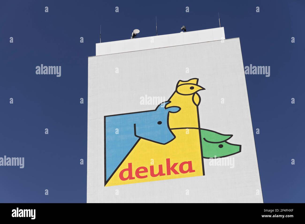 Logo Deuka animal feed at a silo, drawn figures cattle, chicken, pig ...