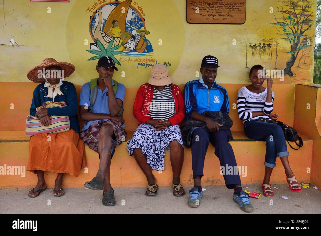 Locals waiting at the bus stop, Gravier, Rodrigues, Mauritius Stock ...