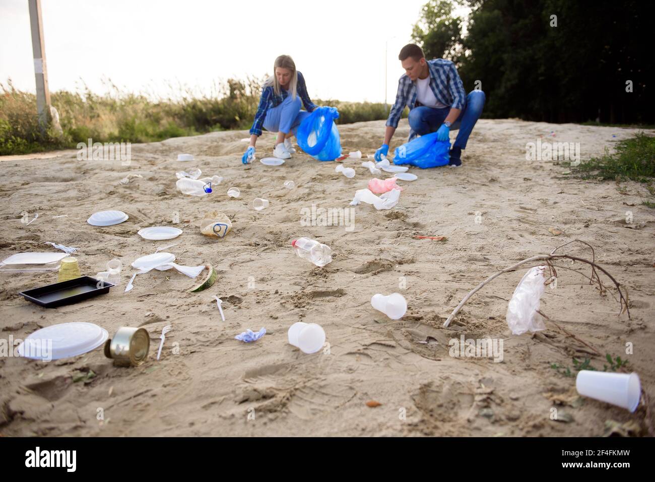 People Picking Up Trash