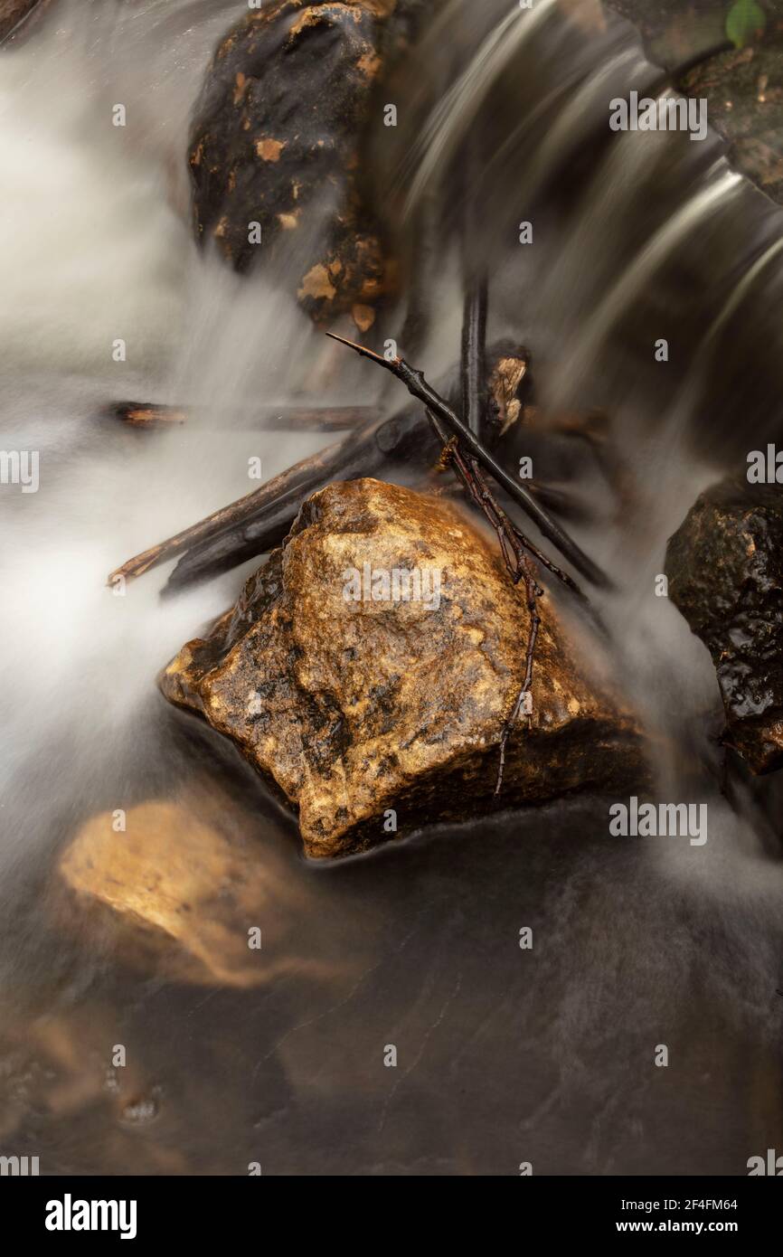 Intimate landscape of section of river cascade with a slow exposure ...